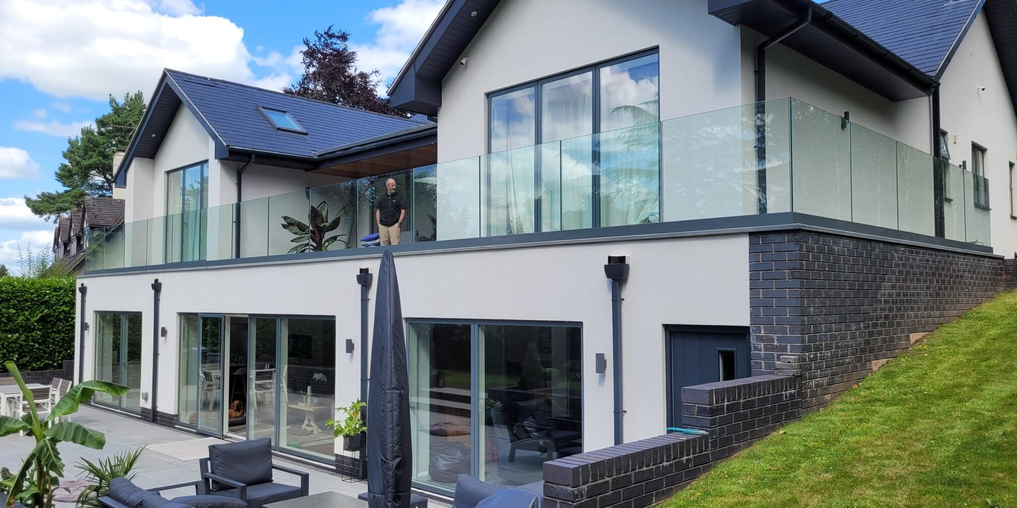 Stunning Frameless Glass Balustrade Installation With Gray Powder ...